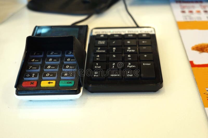 A Payment Point with Credit Card Reader and Keypad for Service a ...