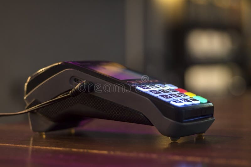 Payment Pos Terminal on a Store Counter Background Stock Image - Image ...