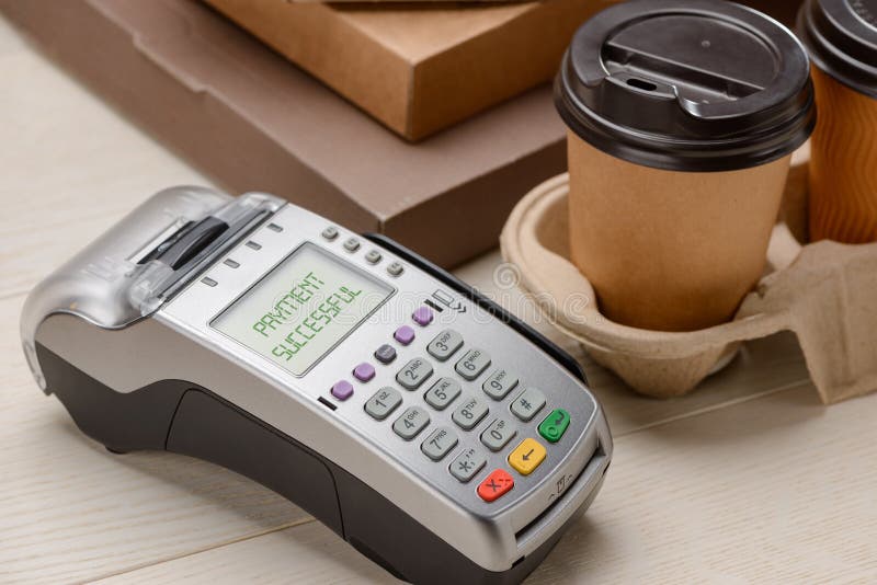 Payment Terminal and Coffee Cups on Wooden Table Stock Image - Image of ...