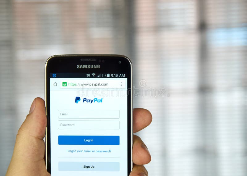 PayPal on a cell phone. editorial photo. Image of device - 68048036