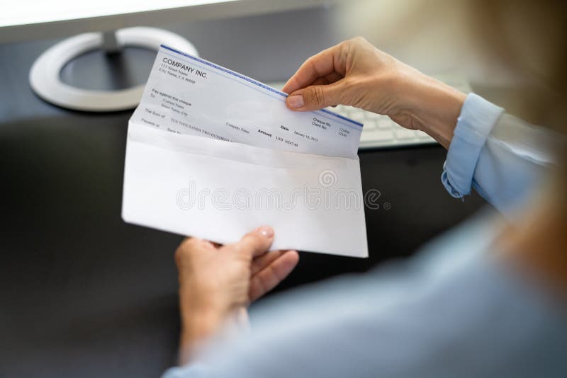 Handing Payroll Cheque To Employee Stock Photo - Image of flare ...