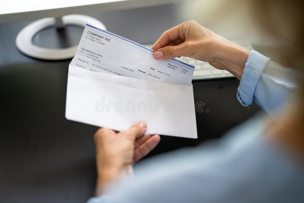 Payroll Cheque in Envelope stock image. Image of insurance - 255604193