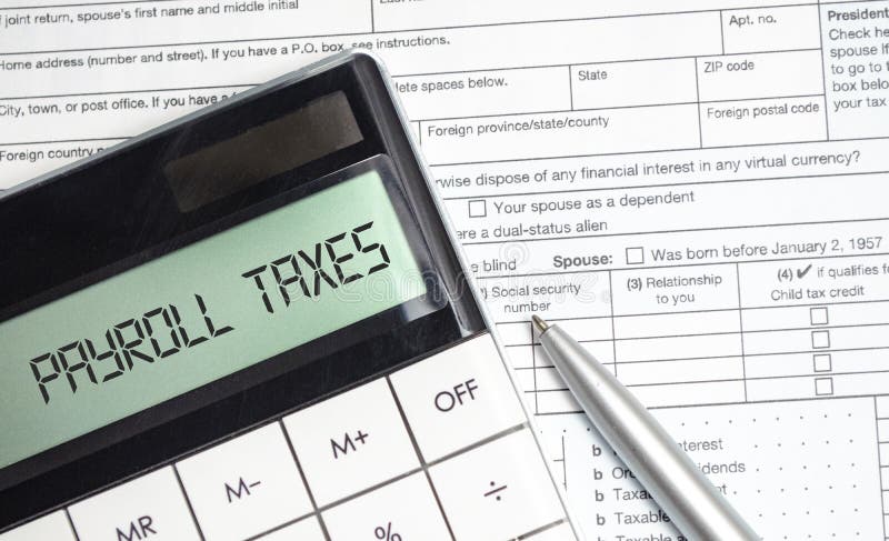 Payroll Taxes Words on Calculator Display and Tax Forms Stock Image ...