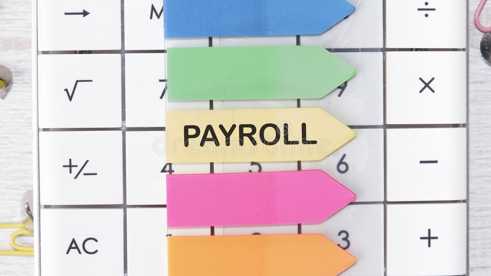 PAYROLL Word on the Sticker in the Shape of an Arrow on the Calculator ...