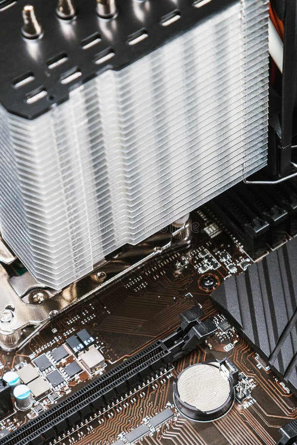 PC CPU Cooler with Heat Pipes Installed on Mainboard Stock Photo ...