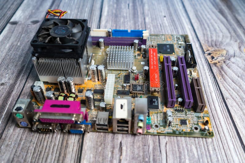 PC Motherboard on a Wooden Table Stock Image - Image of electrical ...