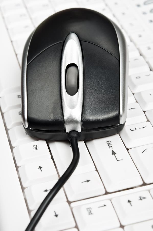 Pc mouse on keyboard stock photo. Image of communication - 20696446
