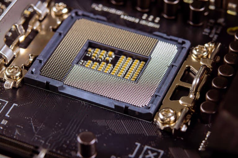 PC Repair at CPU Mounting Motherboard of Processor Connector a Socket ...