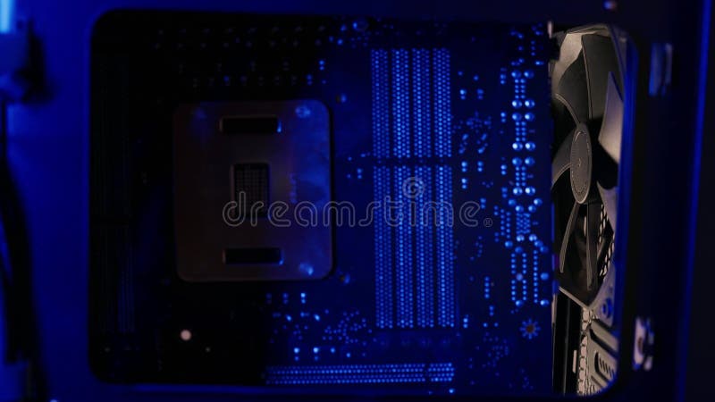 PC Technician Installing Modern Motherboard Close Up in PC Case ...