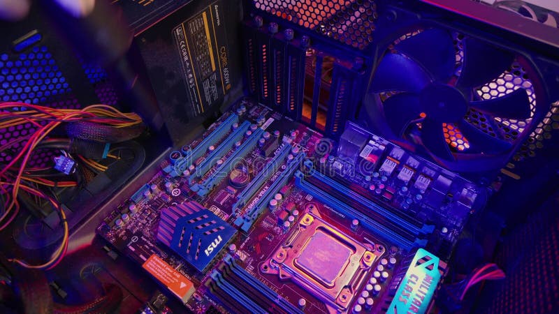 PC Technician Serves Modern Motherboard Close Up. Upgrading Computer ...