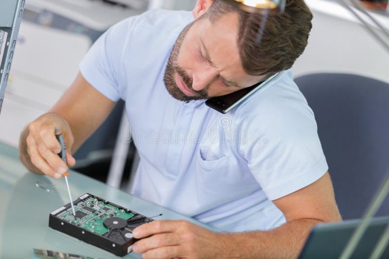 Pc technician at work stock photo. Image of employment - 282142356