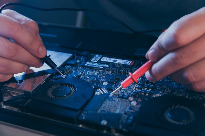 PC Technology .Computer Repair Shop. Engineer Performing Laptop ...