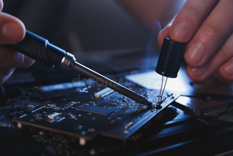 PC Technology .Computer Repair Shop. Engineer Performing Laptop ...