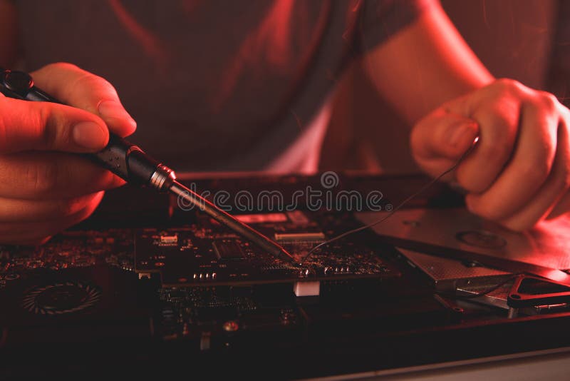PC Technology .Computer Repair Shop. Engineer Performing Laptop ...