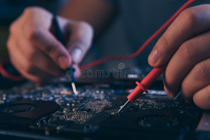 PC Technology .Computer Repair Shop. Engineer Performing Laptop ...