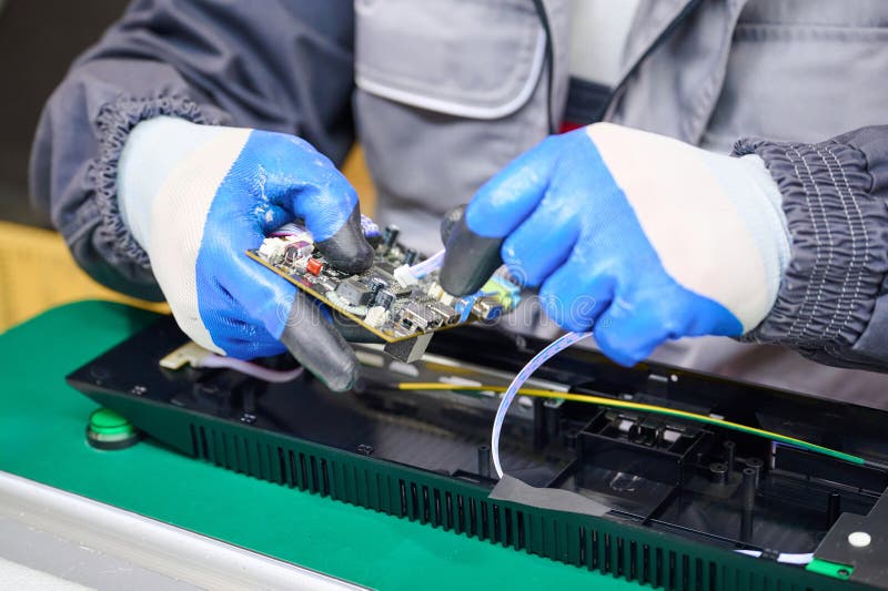 PCB Assembly Process with Gloves in Electronics Manufacturing ...