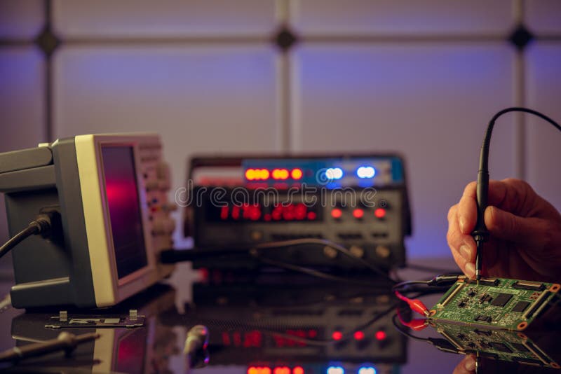 Debugging Electronics Device. PCB Witch Microcontroller in Electronics ...