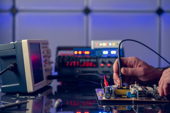 Debugging Electronics Device. PCB Witch Microcontroller in Electronics Laboratory Stock Photo ...