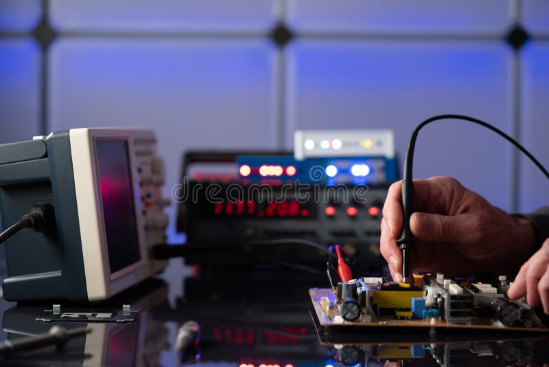 Debugging Electronics Device. PCB Witch Microcontroller in Electronics ...