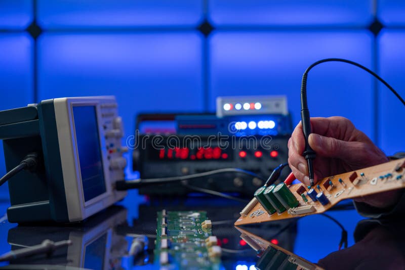 Debugging Electronics Device. PCB Witch Microcontroller in Electronics ...