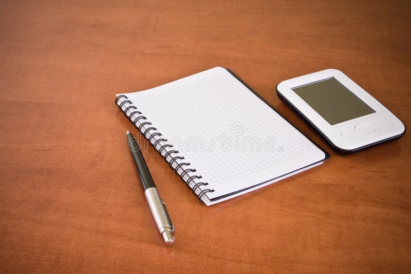 Pda, notebook and pen stock photo. Image of notepad, organizer - 12104478