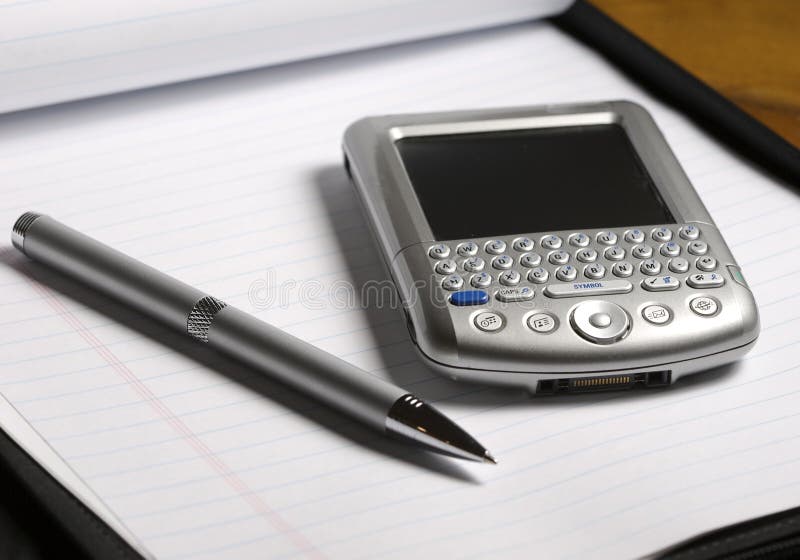 PDA & Pen on Notebook stock photo. Image of palm, button - 458296