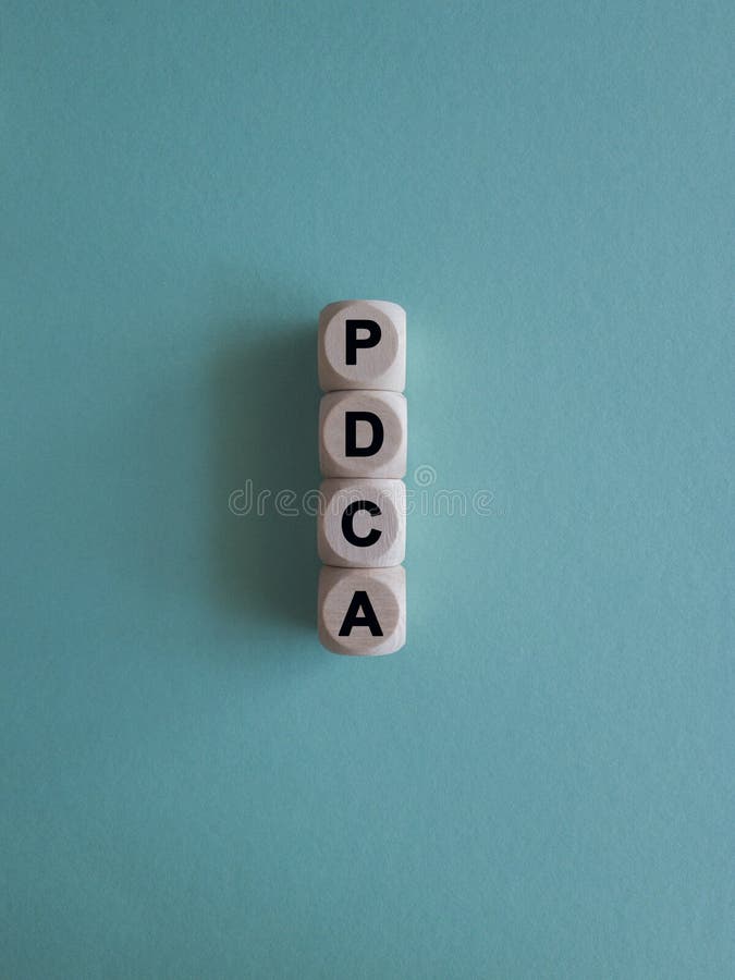 PDCA Written on Wooden Cubes. Beautiful Blue Background Stock Image ...