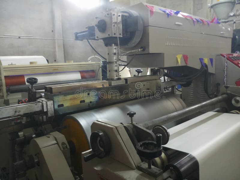 PE, Polyethelene Coating Machine Running Inside a Factory. PE Coating ...