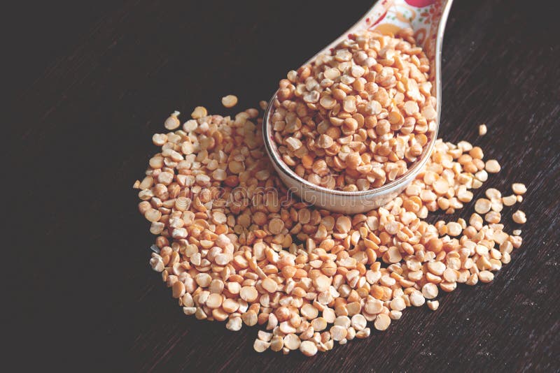Pea groats on a dark table stock photo. Image of horizontal - 139742812