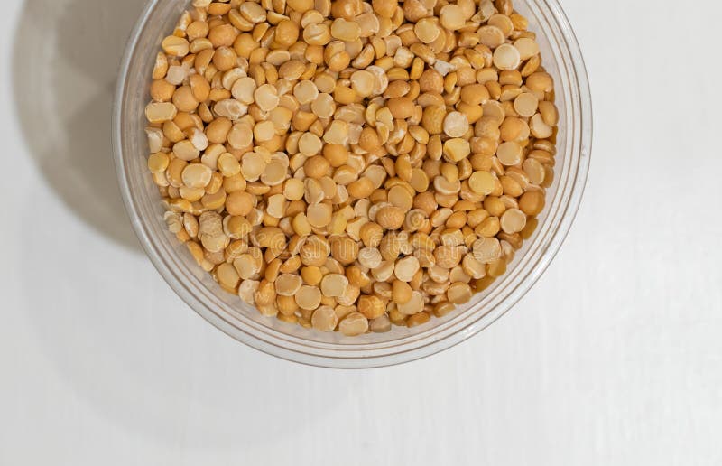 Pea Halves in Plastic Cup on White Table Stock Photo - Image of ...