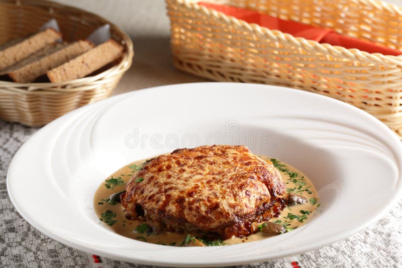 Peace of Meat on White Dish Stock Photo - Image of gourmet, cuisine ...