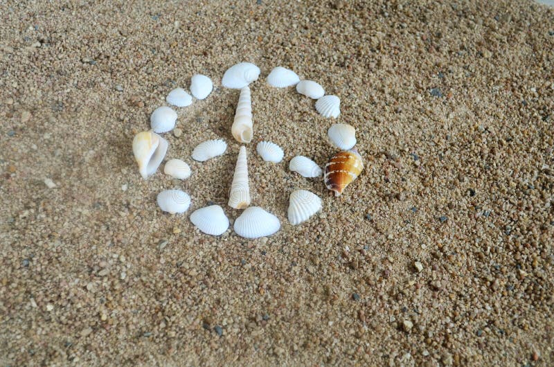 Peace Sign Made with Shells on the Beach. Stock Photo - Image of water ...