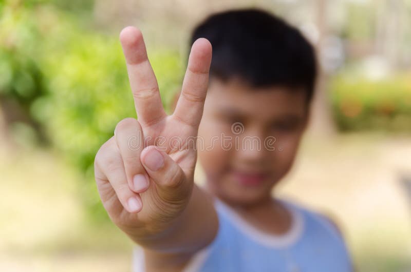 1,787 Boy Showing Peace Sign Stock Photos - Free & Royalty-Free Stock ...