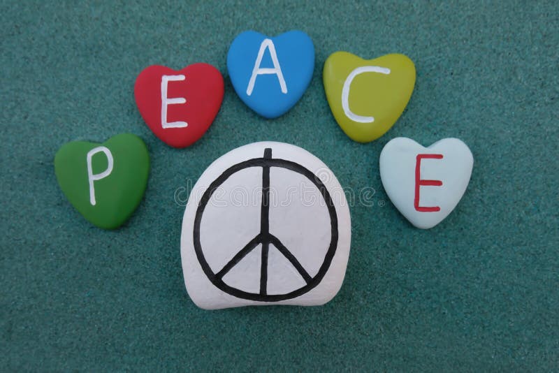Peace Symbol on a Stone with Peace Text on Colored Heart Stone Letters ...