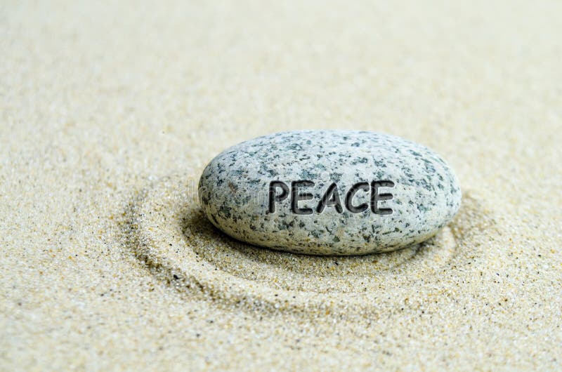 Peace Text Engraved on Stone with Sand Beach Background. Peace of Mind ...