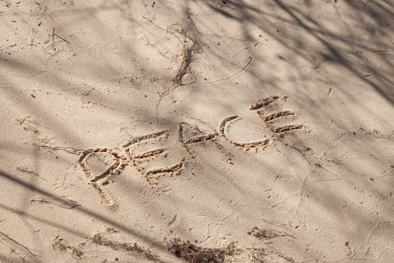 Peace Written in Sand stock image. Image of carved, scribbled - 85144451
