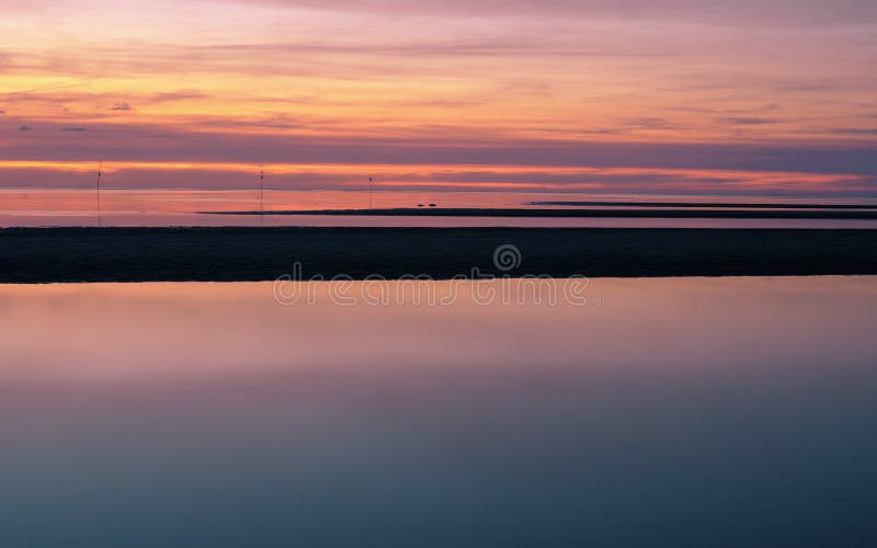 Tranquil Abstract Seascape Over the Horizontal Sand Bars and Trees in ...