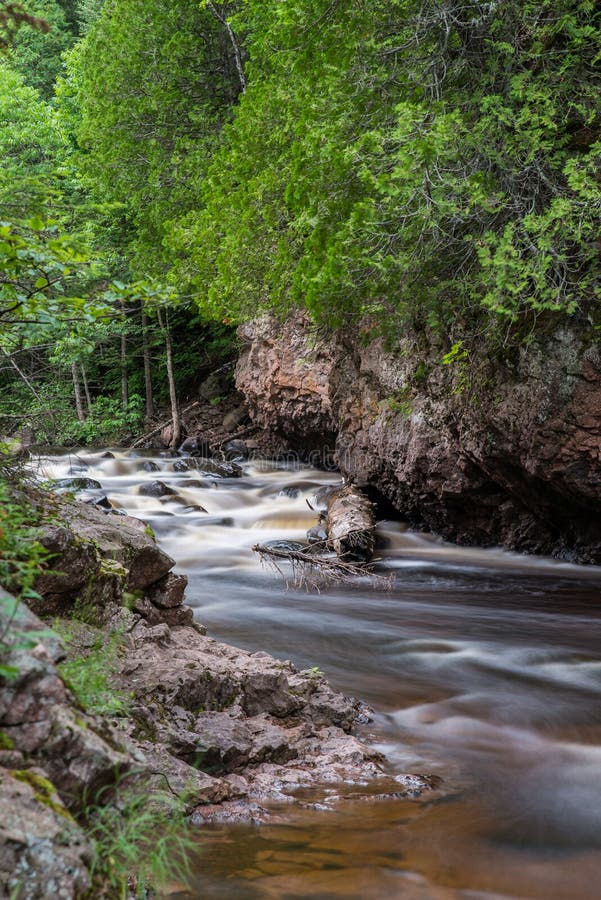 Peaceful Cascade River stock image. Image of rocks, flowing - 57341273