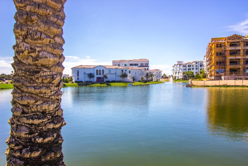 Peaceful Lagoon with Multi Story Buildings Stock Image - Image of site ...