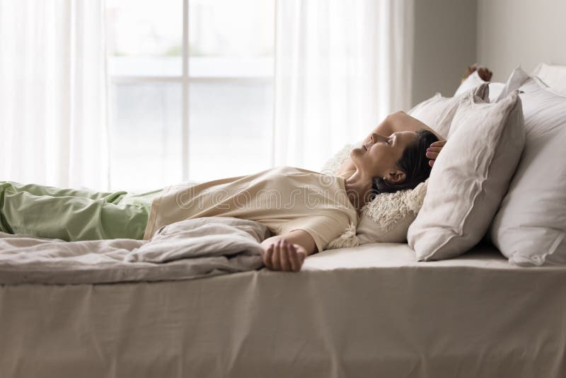 Peaceful Middle-aged Woman Sleeping, Lying on Comfortable Bed Stock ...