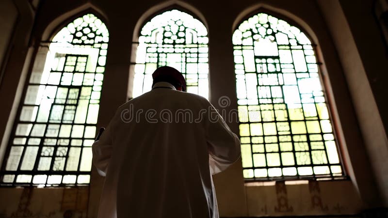 A Moment of Reflection and Prayer in a Serene Mosque during the ...