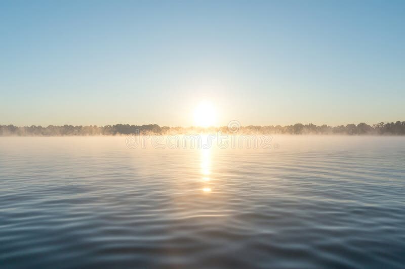 A Peaceful, Motionless Blue Ocean Shrouded in Fog Stock Image - Image ...