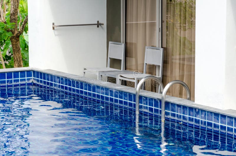 Peaceful Poolside Area with Exit from the Hotel Room To the Pool Stock ...