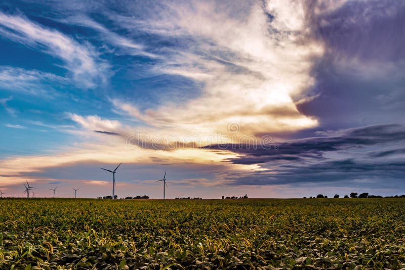 Dramatic Clouds Rolling Over Quiet Field Sunset Stock Photos - Free ...