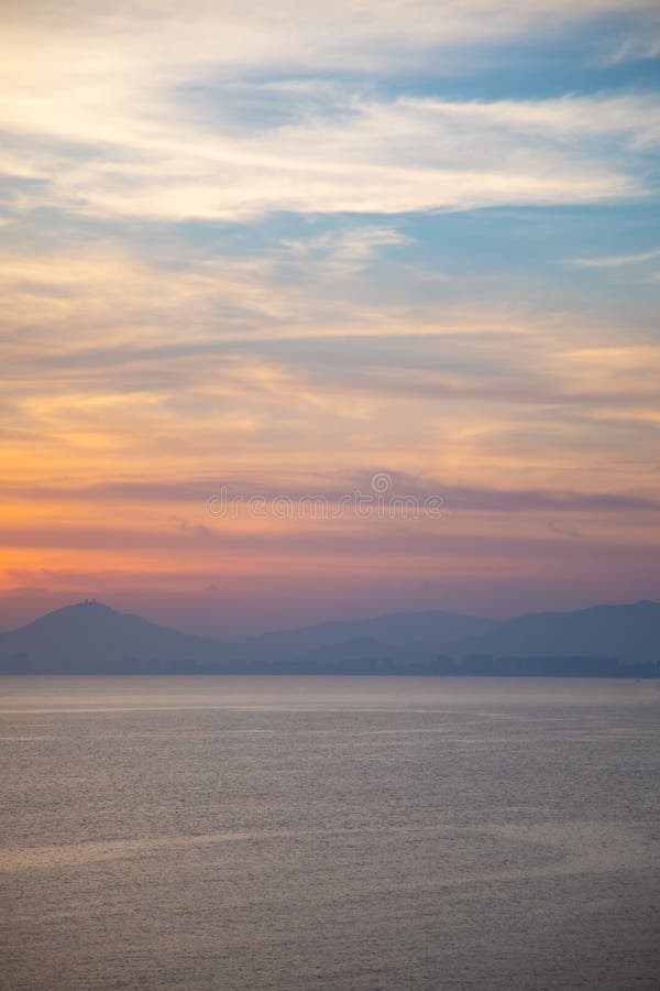 A Peaceful Scene of a Calm Ocean and Gentle Sunset Stock Photo - Image ...