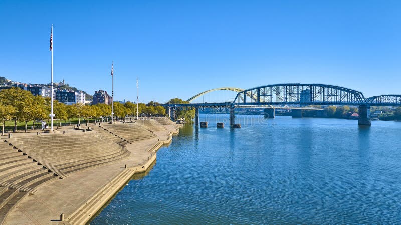 River Park and Bridge and Ohio River with Flags Eye-Level View Stock ...