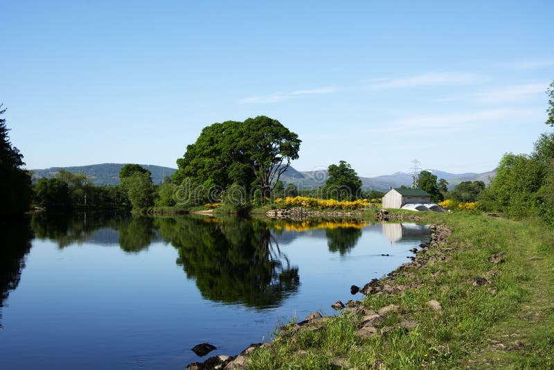 Peaceful Environmental Scene with Flat River and Beautifully Reflected ...