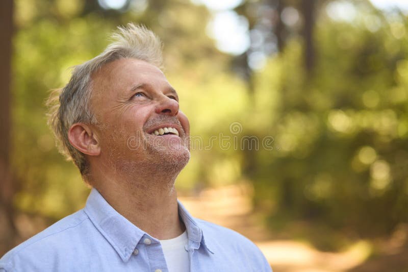 Peaceful Senior Man Relaxing Standing Amongst Nature in Forest ...