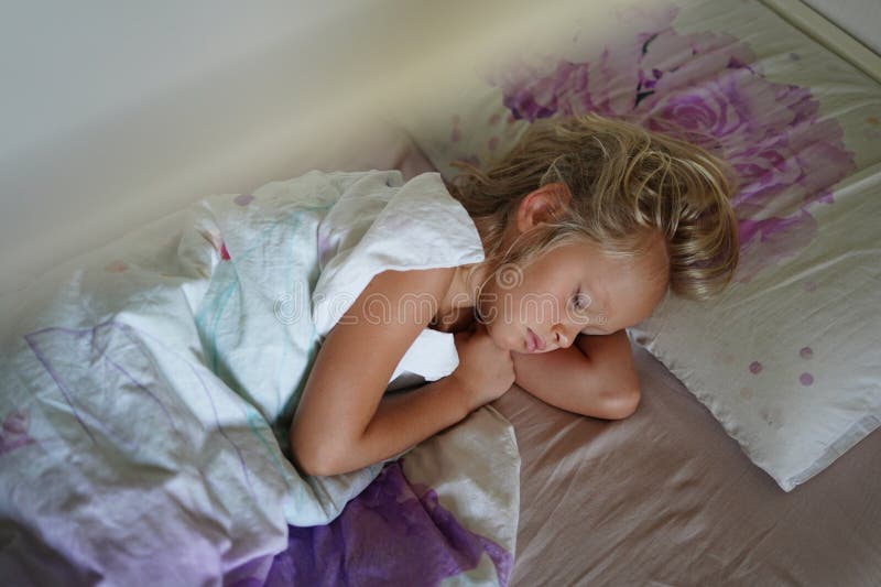 Peaceful Sleeping Child in Bed with Cozy Expression Stock Image - Image ...