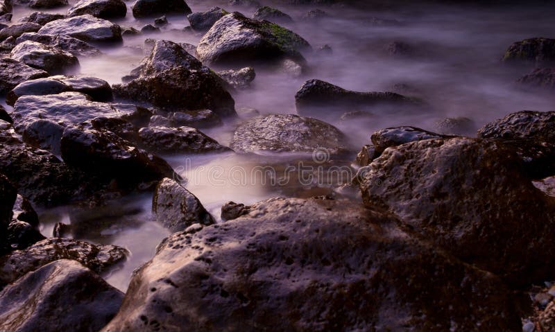 Peaceful Stones at the Sea Shore Stock Photo - Image of dusk, stone ...